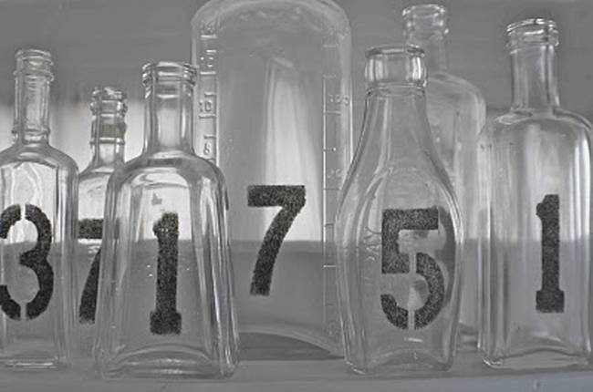 DIY Table Numbers: The Stenciled Glass Bottle | The Dessy Group